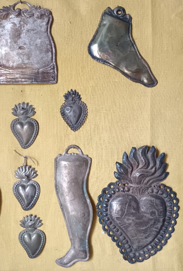 A rare framed collection of seventeen antique ex-votos